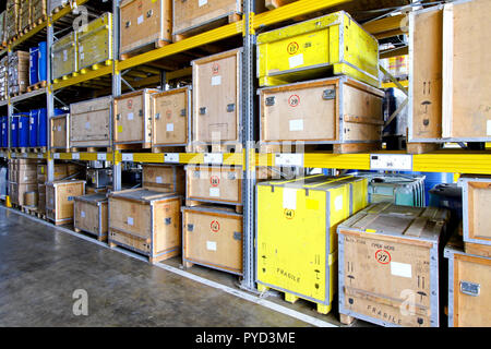Wooden crates at shelves in museum warehouse Stock Photo - Alamy