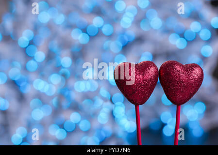 Two red glowing hearts shine together for Valentine's Day Stock Photo ...