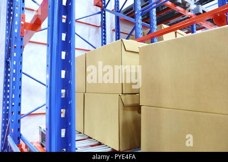 row of cotton boxes kept in warehouse shelves ; logistics Stock Photo ...