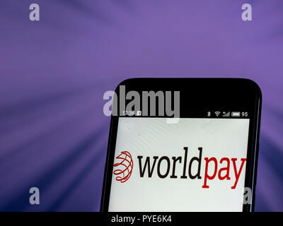 Worldpay Company logo seen displayed on smart phone. Worldpay Group plc ...