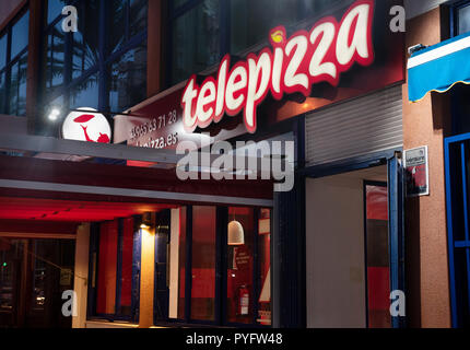 Spanish fast-food restaurant branch of Telepizza and logo seen in ...