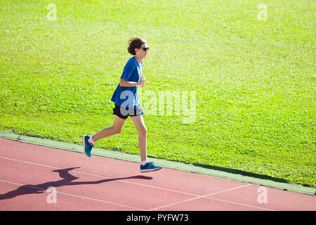 A teenager sprinter Stock Photo - Alamy