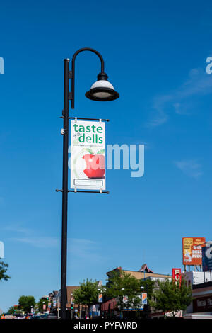 Street light with Wisconsin Dells district signs. Wisconsin Dells ...