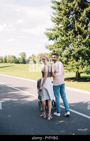 Infant in pram looking at camera in wonder Stock Photo - Alamy