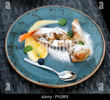 Macro photo of bright blueberry pie and ice cream on a dark plate Stock ...