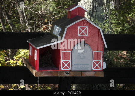 Mailbox in the shape of a small house Stock Photo - Alamy