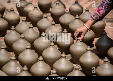 A Nepalese potter making pots from clay in Bhaktapur Nepal Stock Photo ...