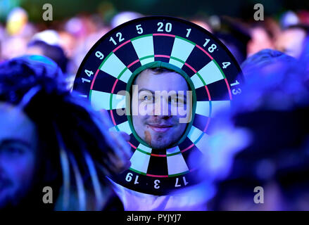 A fan wearing a dartboard costume in the crowd during night four of the ...