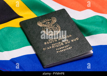 South African passport on the South African flag, top view Stock Photo ...