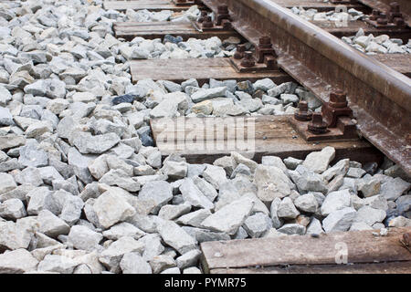 Newly laid train track timber ballast detail Stock Photo - Alamy