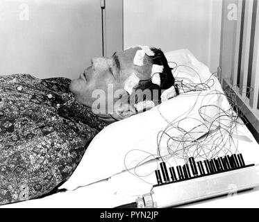 Scott Carpenter, American astronaut, with biosensors attached to his ...