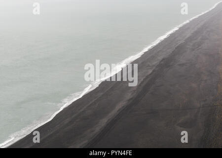 Close-up of black lava sand beach, Iceland Stock Photo - Alamy