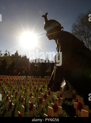 Captain Gary Rattray from 2 Scots Royal Regiment of Scotland lays a ...