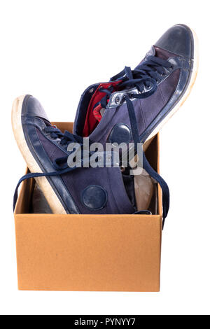 Cardboard box with blue sneakers on pink background Stock Photo - Alamy