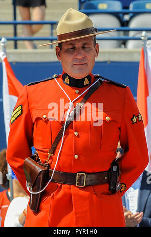 Royal Canadian Mounted Police officers in full dress uniform ...