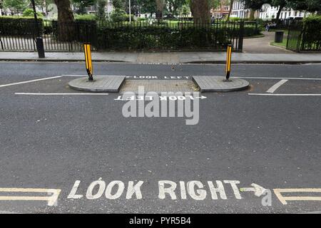 London pedestrian signs - look left and look right. Traffic warning ...