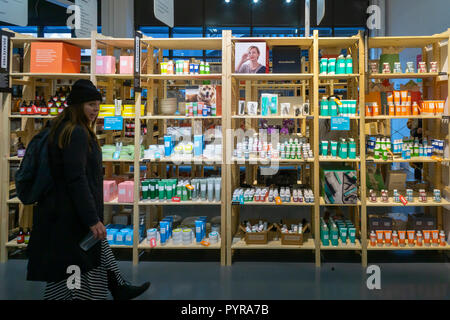 Shoppers browse merchandise in the pop-up store of Miniso in Soho in ...