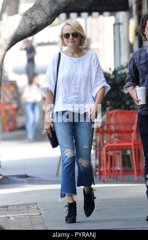 Actress Malin Akerman and fiance Jack Donnelly hold hands after a ...