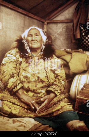 Early 1970s elderly Eskimo woman from the Kotzebue Sound region wearing ...