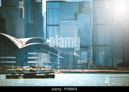 Hong Kong Cityscraper with sun ray Stock Photo - Alamy