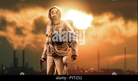 Brave post apocalyptic survivor with mask and documents: environmental ...