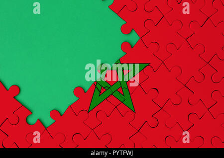 Morocco flag depicted on side part of military armored tank close up ...