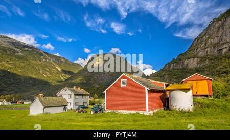 Traditional Norwegian red wooden barns on the sea coast Stock Photo - Alamy