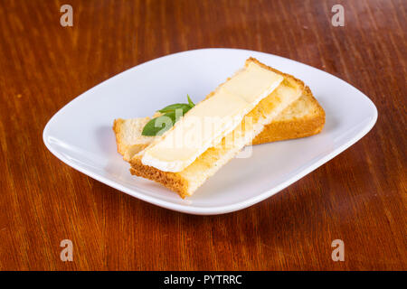 Sandwith with brie cheese over wooden background Stock Photo - Alamy