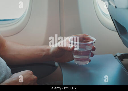 inside a passenger plane during flight Stock Photo - Alamy