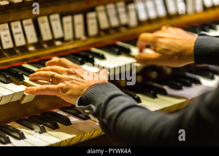 male hands playing organ keyboard in church Stock Photo - Alamy