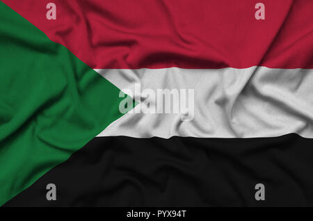 Sudan flag depicted on many small shiny sequins. Colorful festival ...