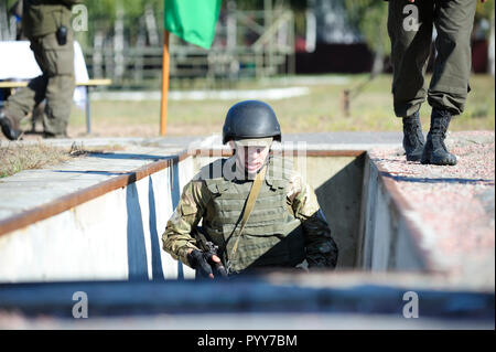 Woman crawling on ground Stock Photo - Alamy