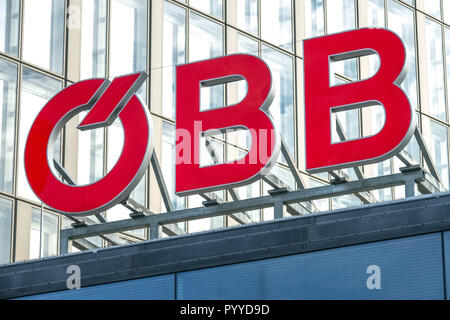 A logo sign outside of a OBB (Austrian Federal Railways) station in ...