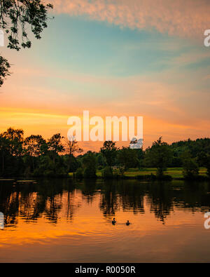 Sunset at the lake Stock Photo - Alamy