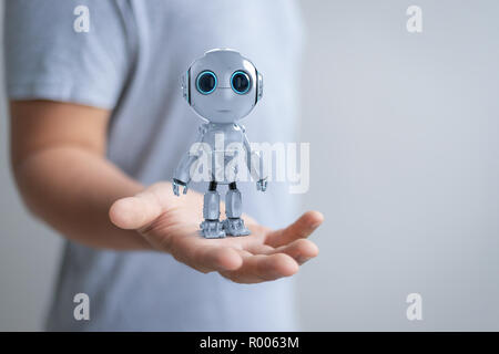 3d rendering mini robot in human hand Stock Photo - Alamy