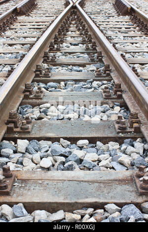 Newly laid train track timber ballast detail Stock Photo - Alamy