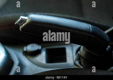 Manual brake in interior of modern car. Car parking brake Stock Photo ...