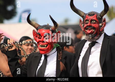 Men performing Dance of the Devils (danza de los diablos or diablada ...