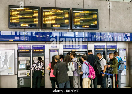 People using train ticket machines at Waterloo Station, London, England ...