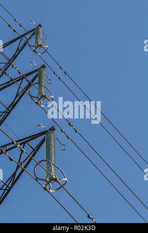 Power line transmission pylons showing Glass insulators. London UK ...