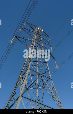 Power line transmission pylons showing Glass insulators. London UK ...