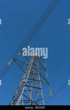 Power line transmission pylons showing Glass insulators. London UK ...