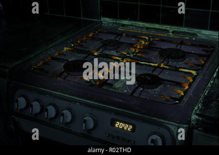 What at first glance a clean gas cooker reveals dirt, splattered oil ...