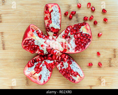 Cutting Fresh red pomegranate Stock Photo - Alamy