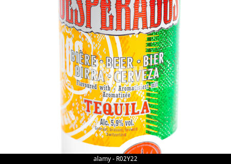 Bottle of Mexican Desperados Tequila beer with lime wedge and nachos ...