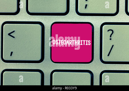 Conceptual hand writing showing Osteoarthritis. Business photo text ...