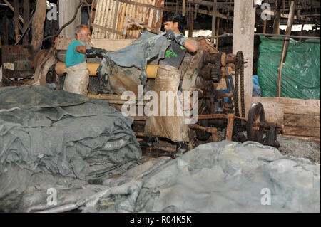 Dhaka, Bangladesh - January 04, 2016: Bangladeshi tannery workers ...