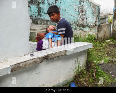 Manila, Philippines, young boy sleeping in the street Stock Photo - Alamy