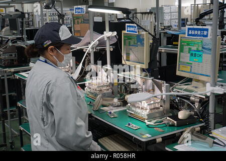 Fukuoka, Japan. 01st Nov, 2018. Employees of the Japanese electronics ...