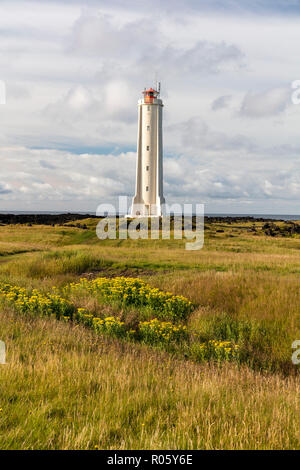 Lighthouse of Malarrif, peninsula Snaefellsnes, in the background the ...